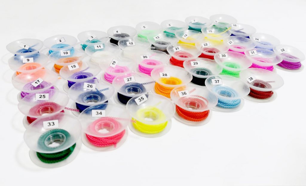 Ligas para brackets caja por 28 colores